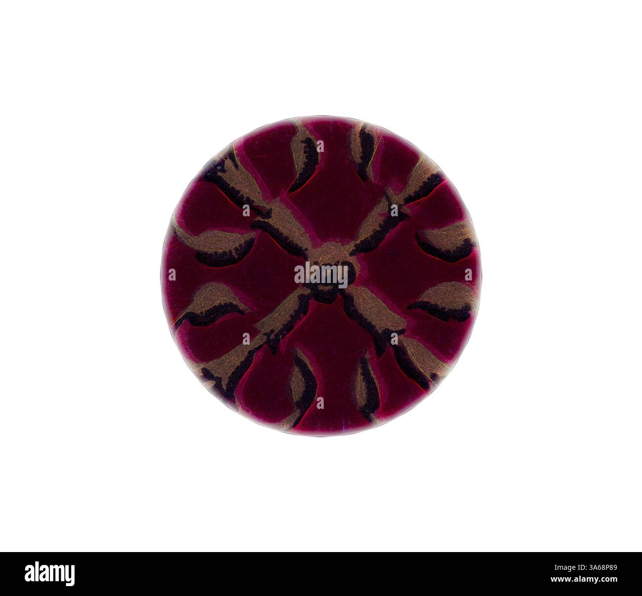 A circular object featuring a rich burgundy background adorned with ...