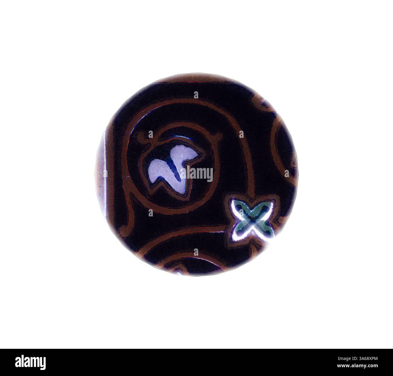 A circular object featuring intricate designs with swirling lines and ...