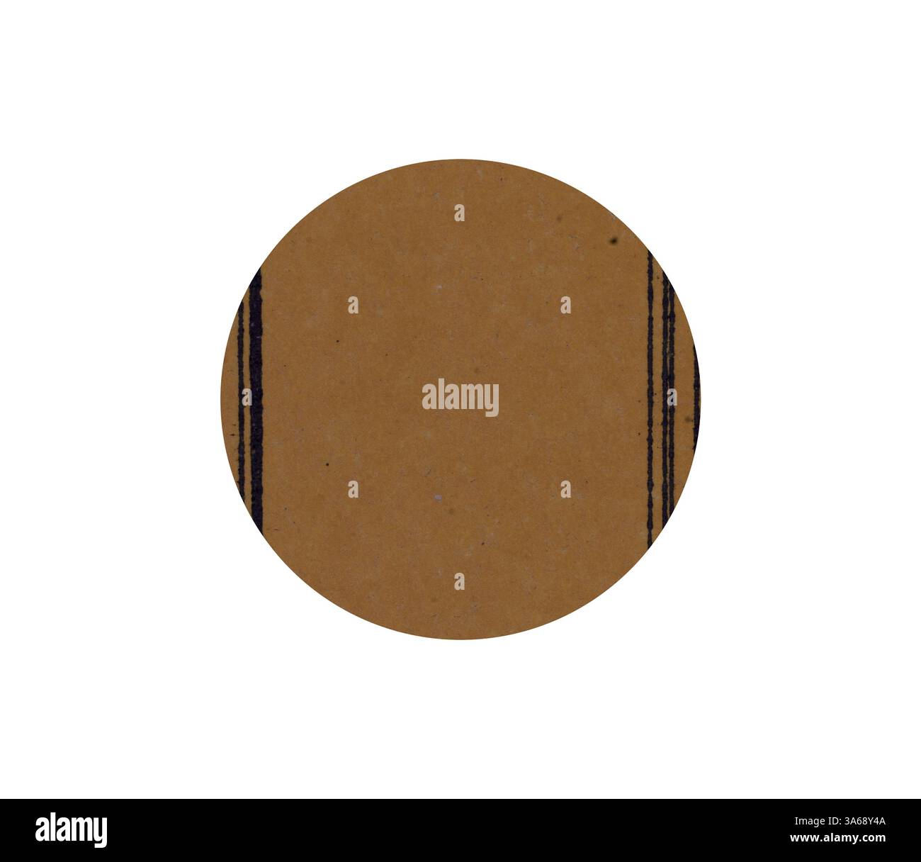 A round piece of cardboard with a brown surface and two vertical black ...