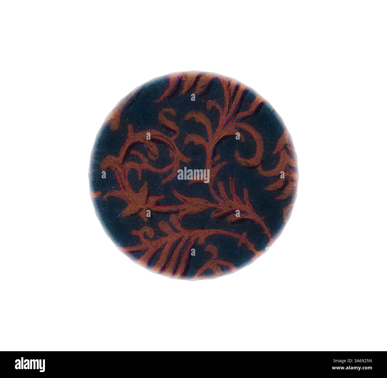 A circular object featuring intricate, swirling patterns in warm tones ...