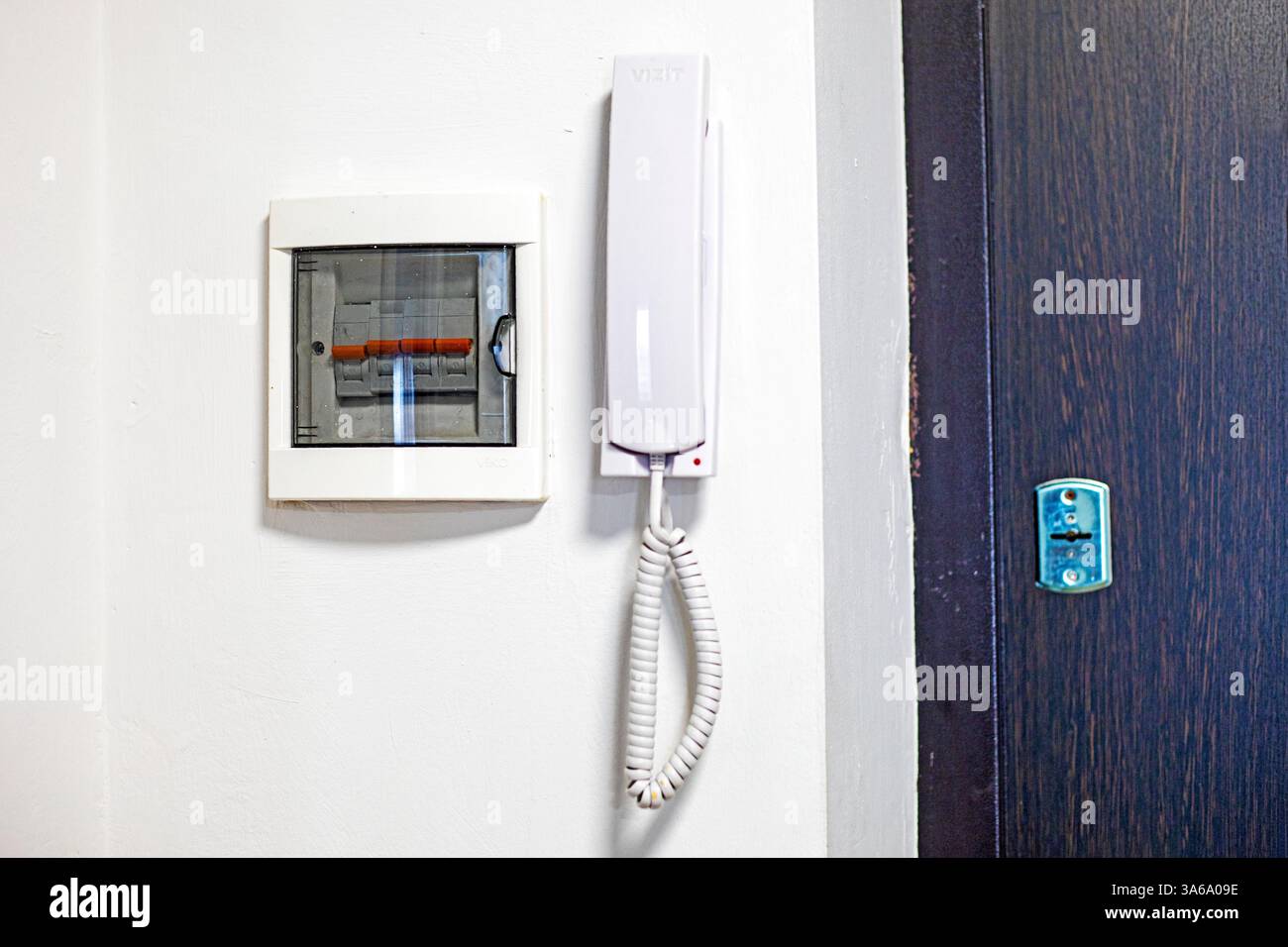 intercom with a panel for voltage regulation in the hallway Stock Photo ...