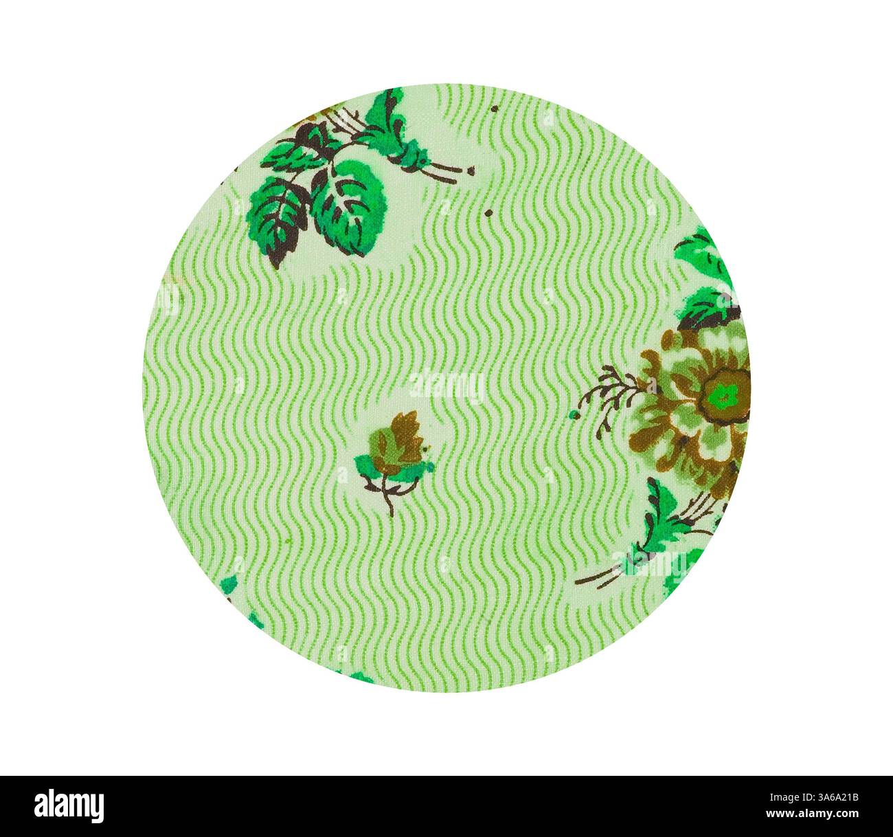 A circular fabric featuring a playful mix of green wavy lines and ...
