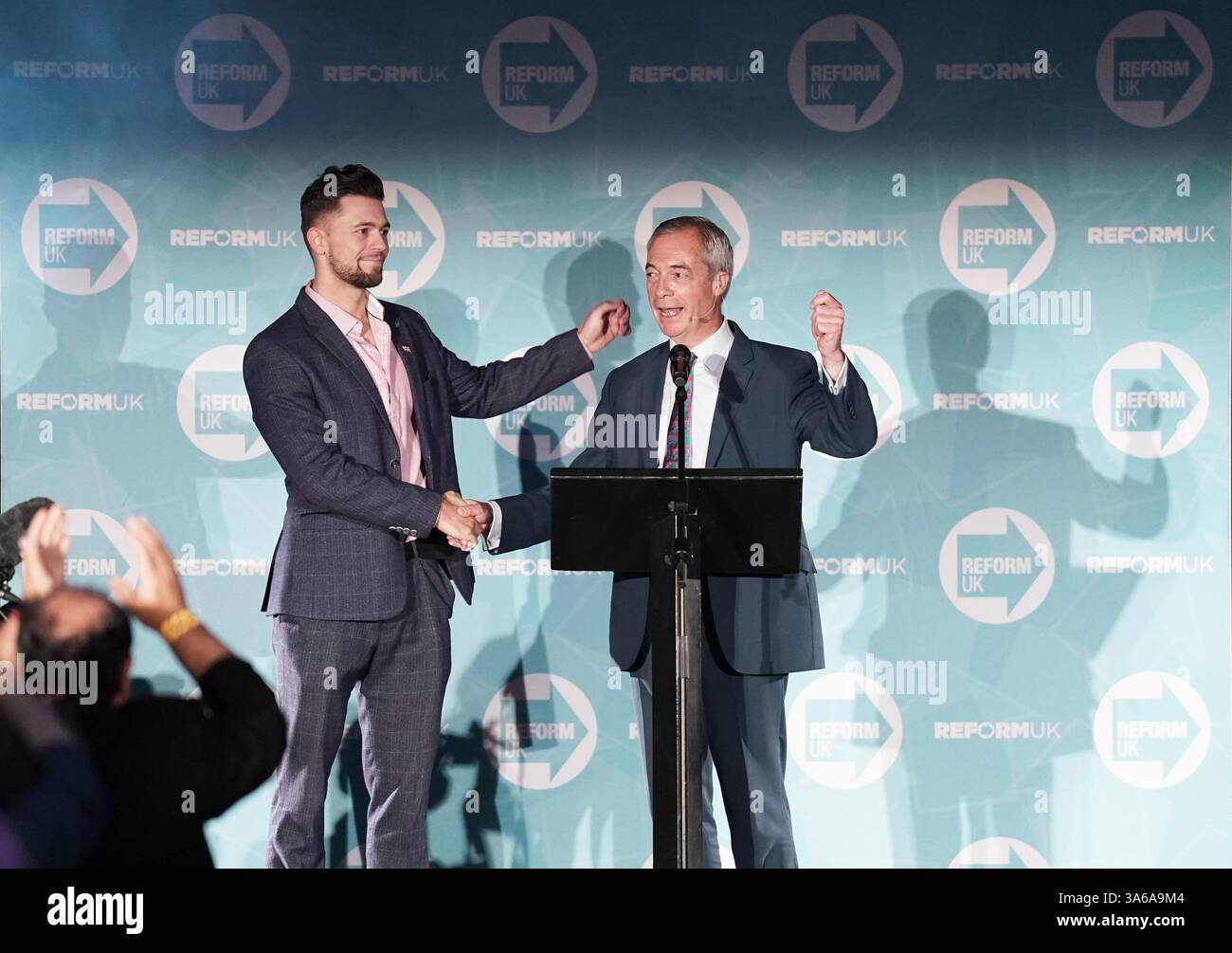 Reform UK leader Nigel Farage (right) and mayoral candidate Alexander ...