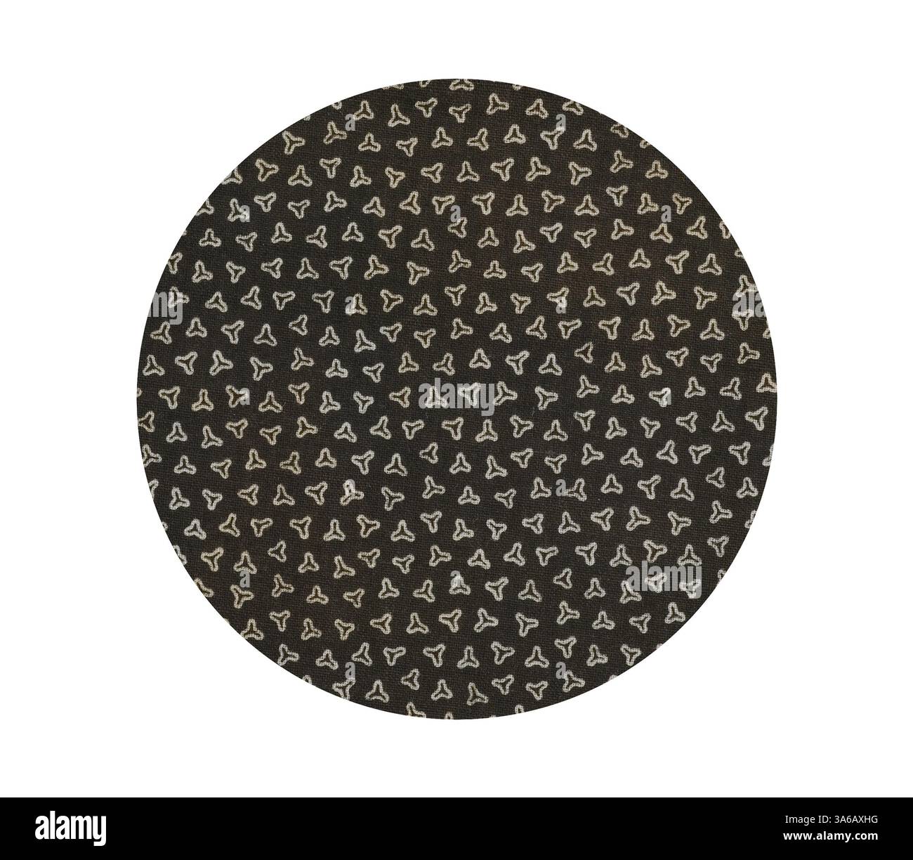 A circular surface featuring a repeating pattern of small, abstract ...