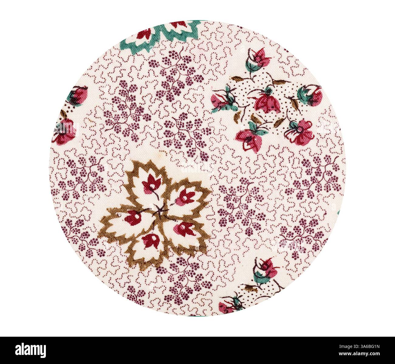A round fabric featuring a delicate floral pattern with intricate ...