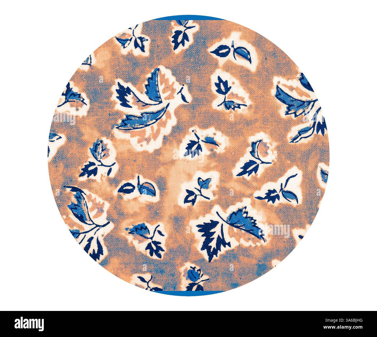A circular fabric features a vibrant pattern of blue leaves and ...