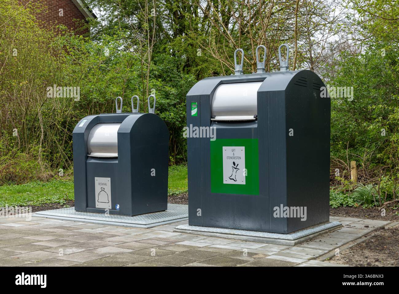 Underground garbage container in the street. Recycling and eco friendly ...