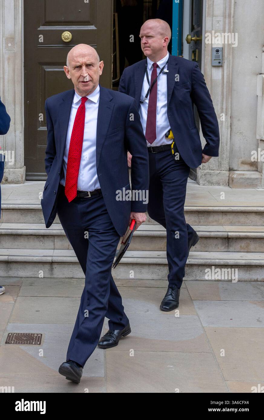 London, UK. 25th Mar, 2025. Defence Secretary, John Healey, leaving the ...