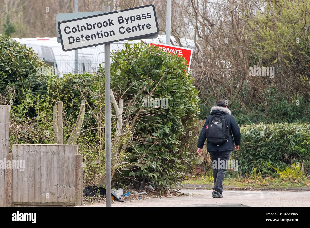 Harmondsworth, West Drayton, UK. 25th March, 2025. A man walks past The ...