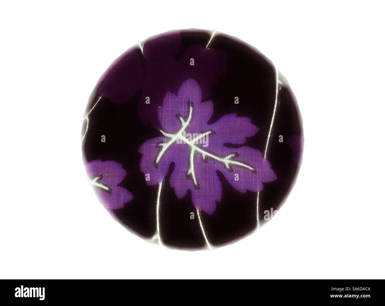 A circular fabric swatch featuring a bold pattern of purple leaves ...