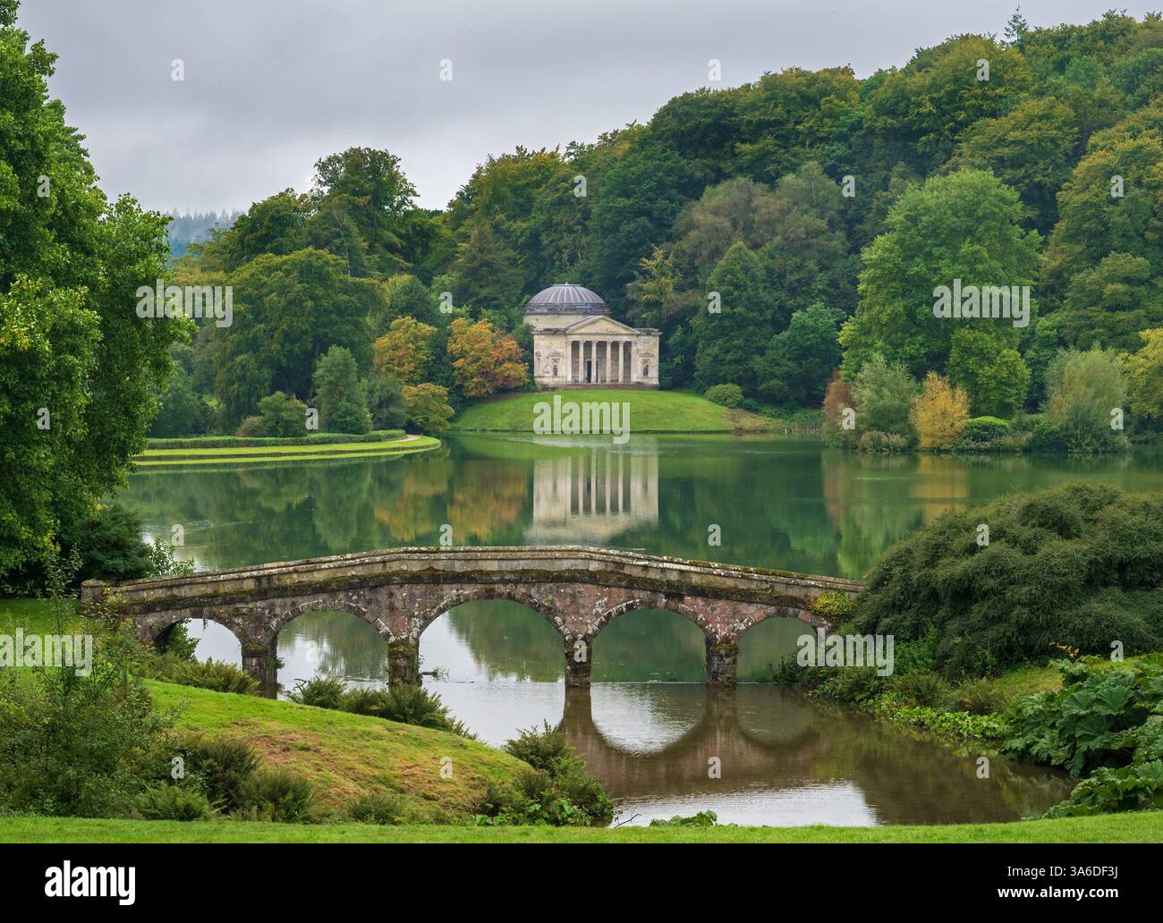 View across the lake at the National Trusts Stourhead gardens with the ...