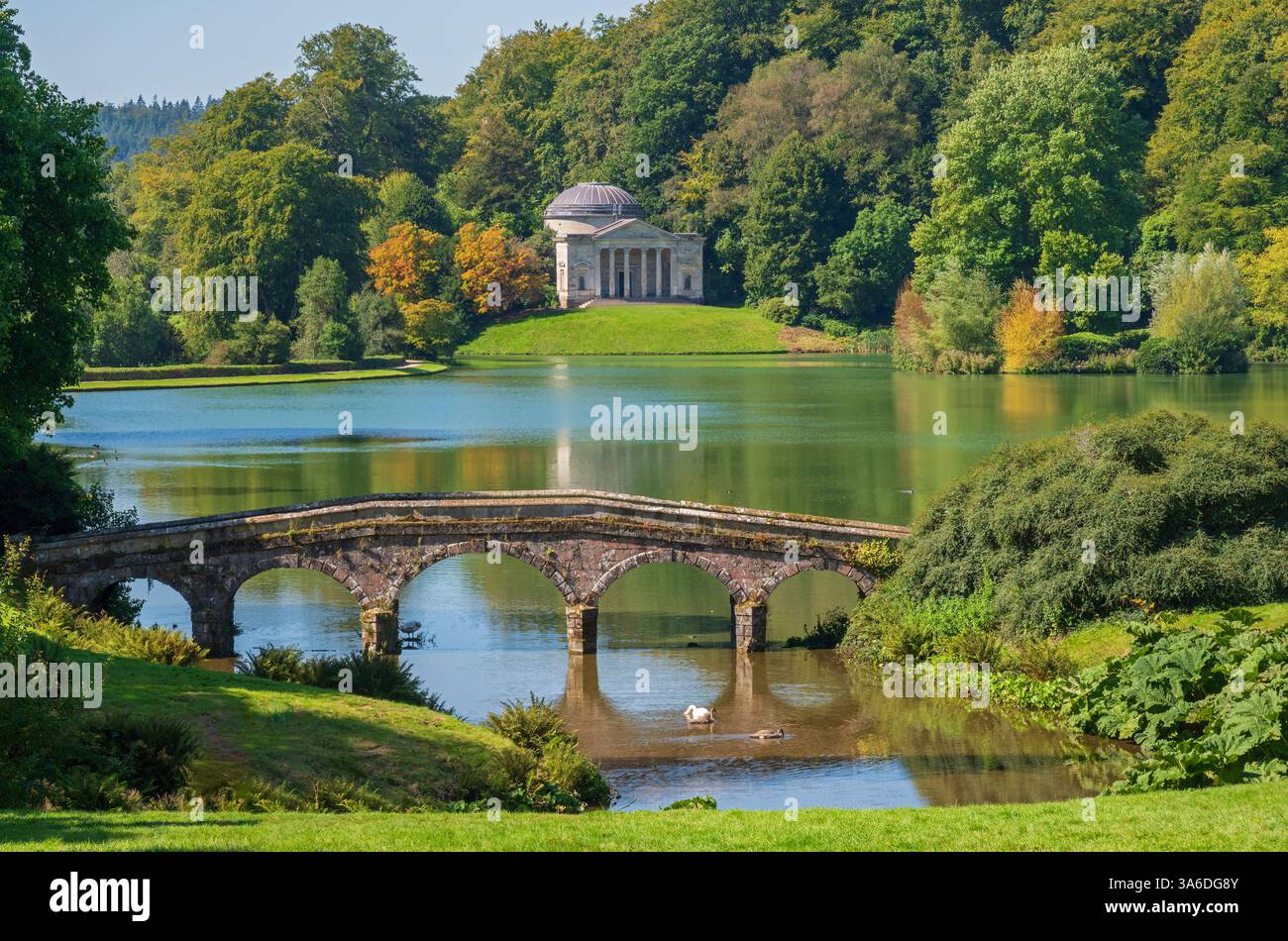 View across the lake at the National Trusts Stourhead gardens with the ...