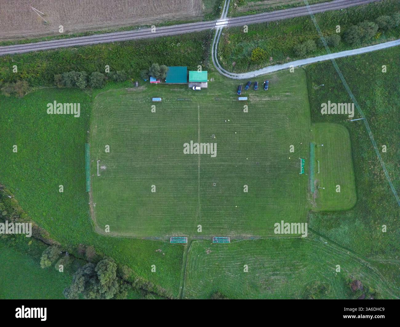 Aerial view capture a local football stadium situated in a tranquil ...