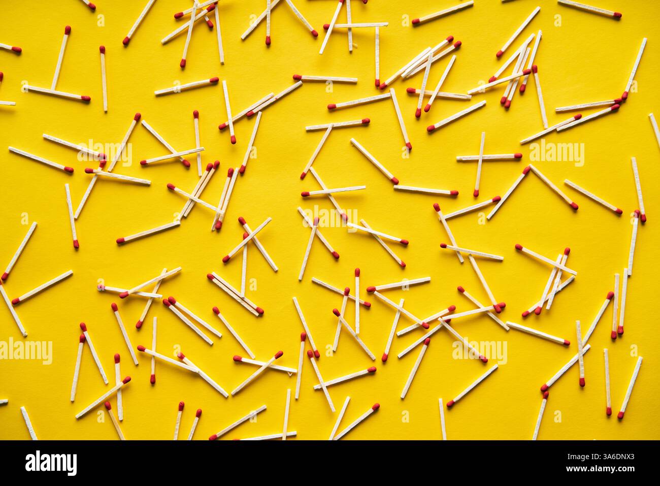 Wooden stick matches over yellow background. Flat Lay Stock Photo - Alamy