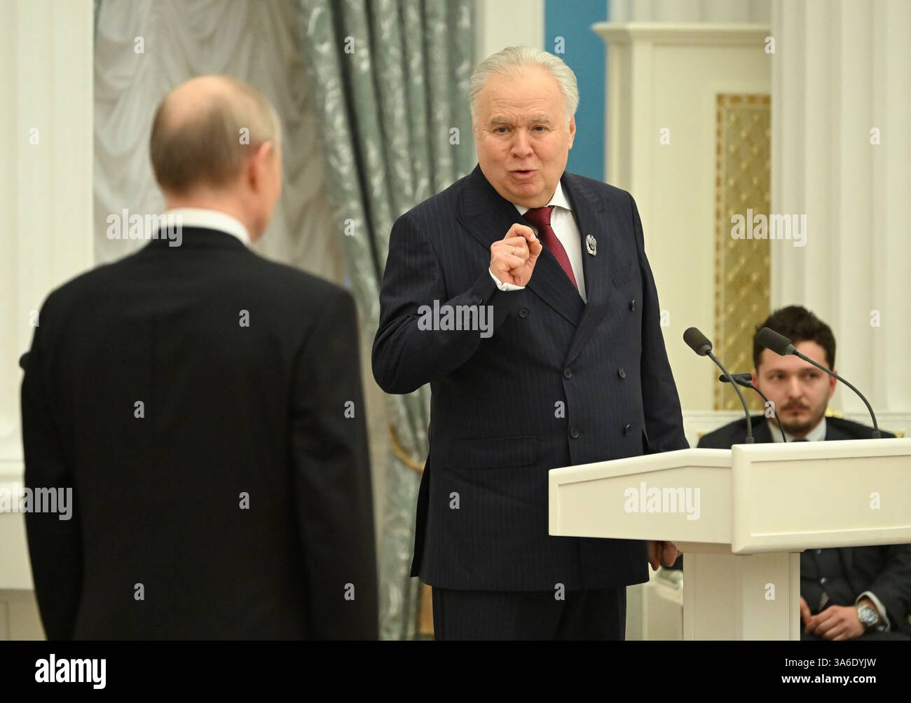Russian President Vladimir Putin (left) and artistic director of the ...