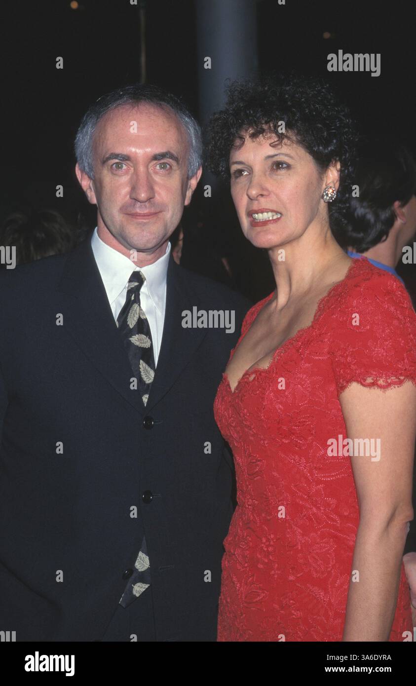 Actor JONATHAN PRYCE & wife KATE @ 'Tomorrow Never Dies' movie premiere ...