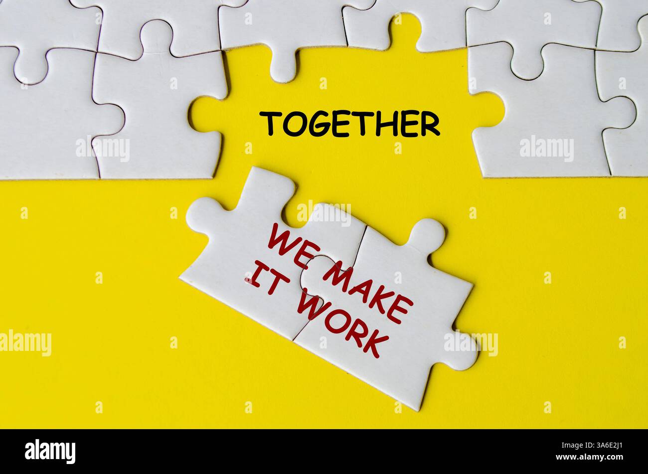 Together We Make It Work text on missing jigsaw puzzle representing ...