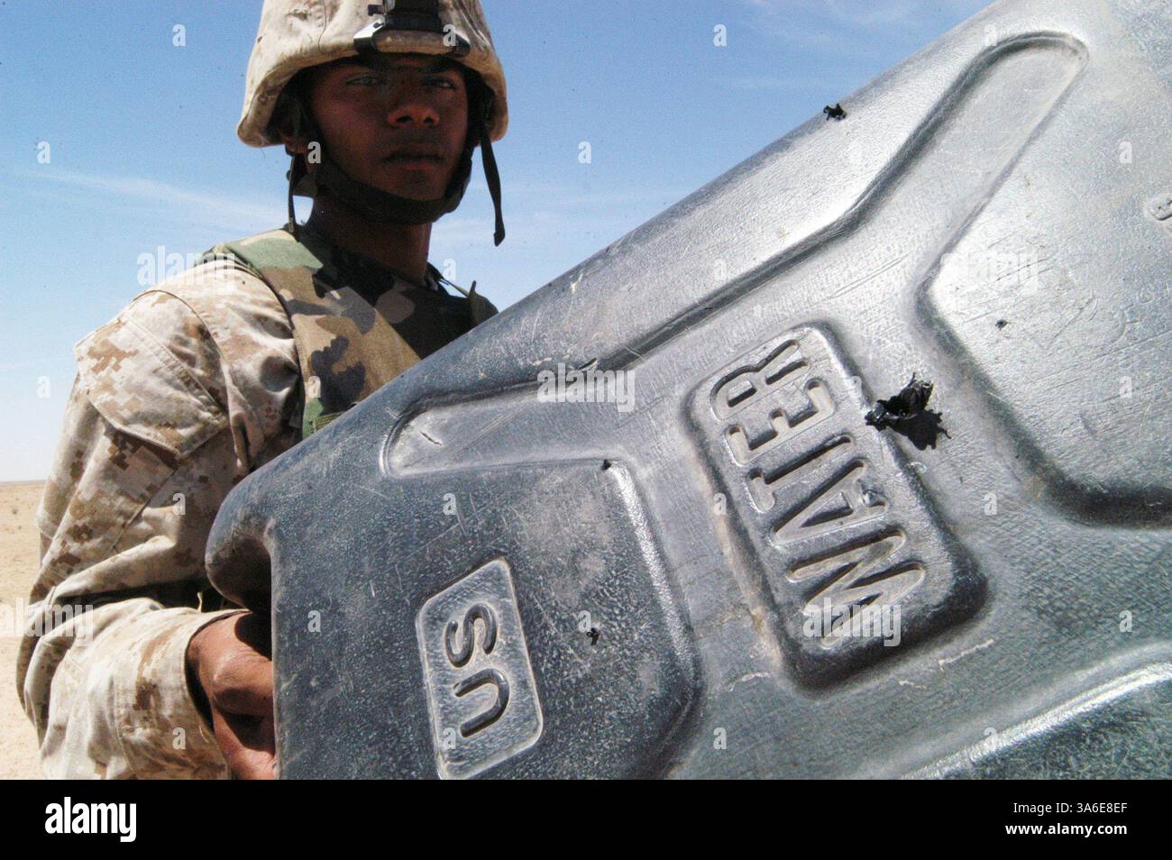 May 07, 2004; Camp Blue Diamond, Iraq; Cpl. DENNIS AIKARA shows off ...