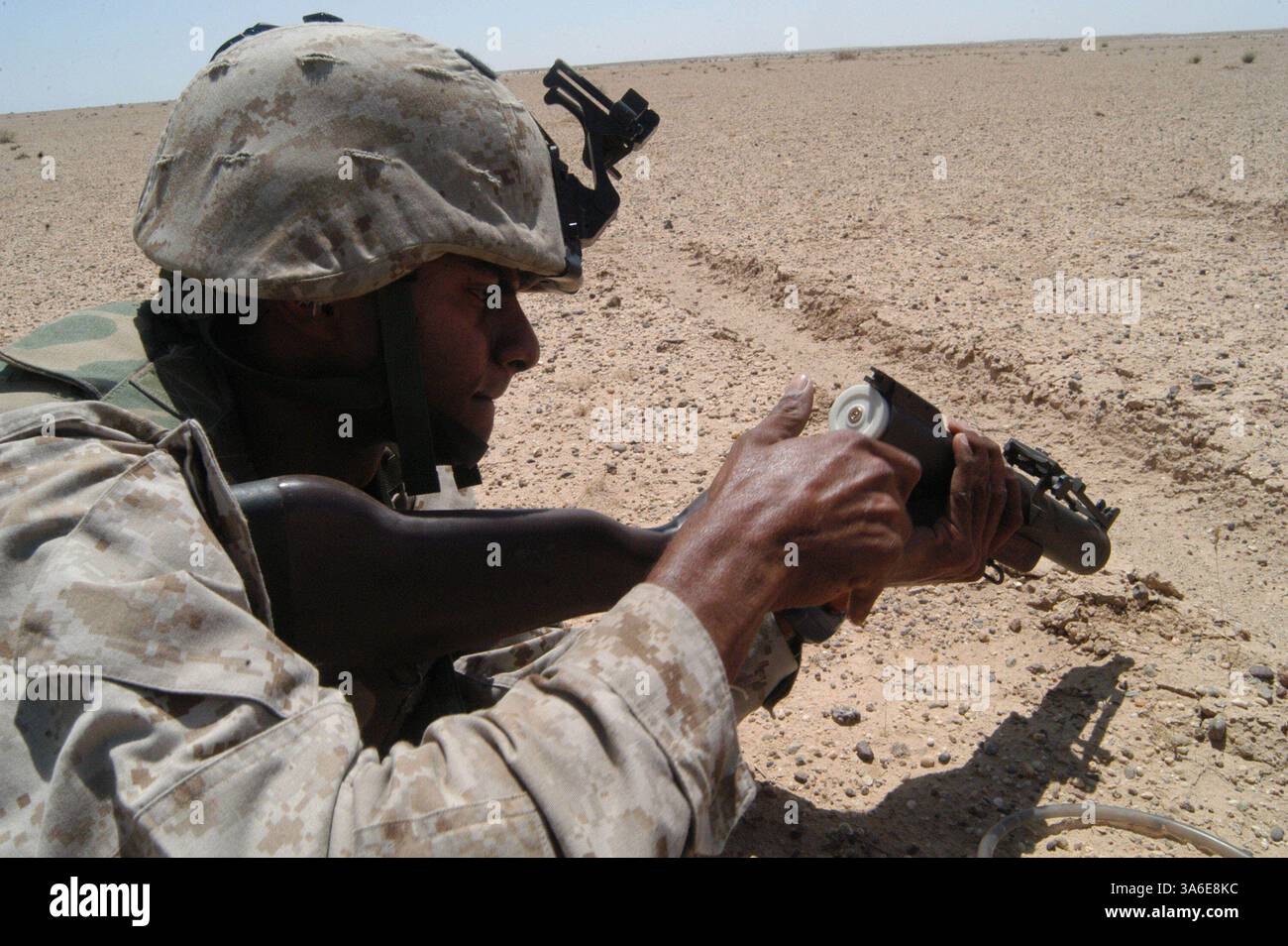 May 07, 2004; Camp Blue Diamond, Iraq; Cpl. DENNIS AIKARA drops a ...