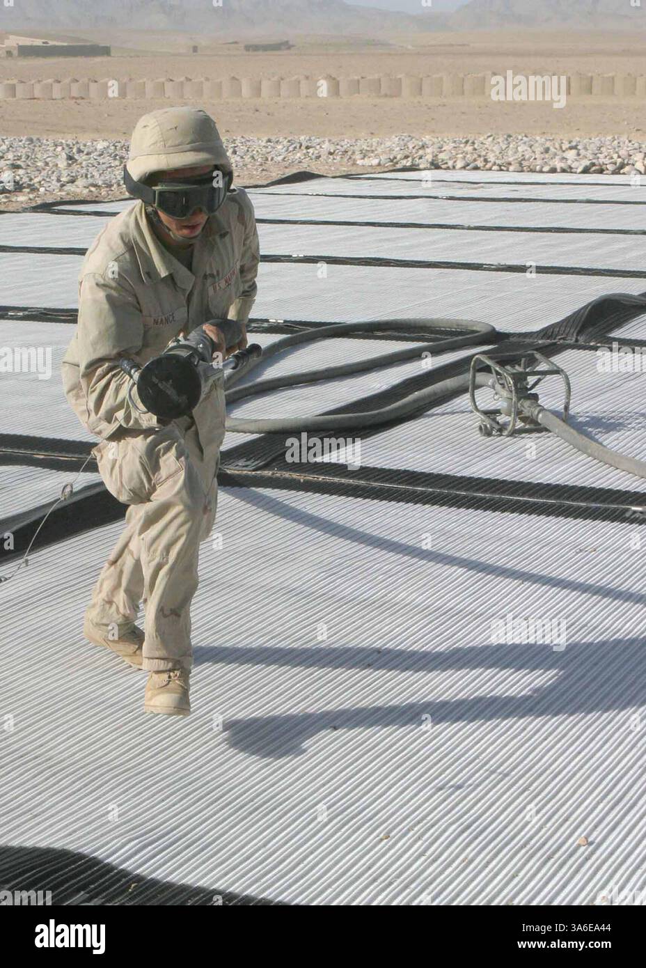 May 22, 2004; FOB Ripley, Afghanistan; Lance Cpl. MICHAEL NANCE, a bulk ...