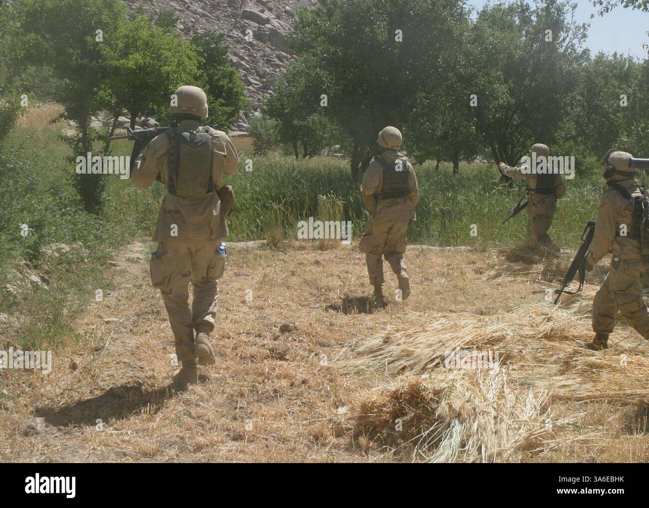 Jun 02, 2004; FOB Ripley, Afghanistan; Weapons at the ready and under ...
