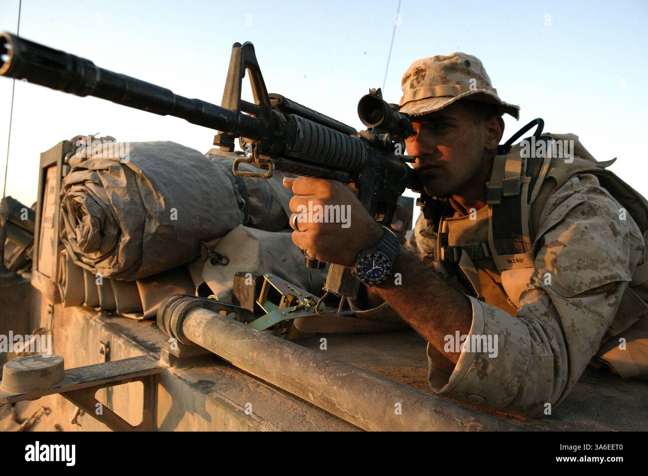 Sep 02, 2004; Northwest, Iraq; Lanc Cpl. NEAL WALKER provides ...