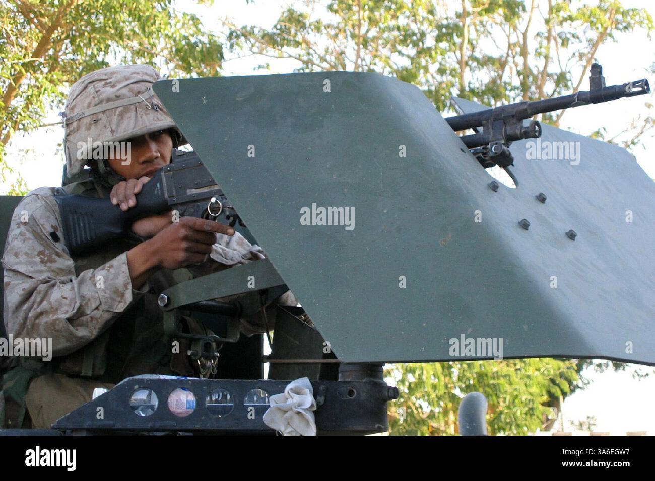 Sep 10, 2004; Northern Babil, Iraq; Lance Cpl. RATTANAKA YUN of the ...