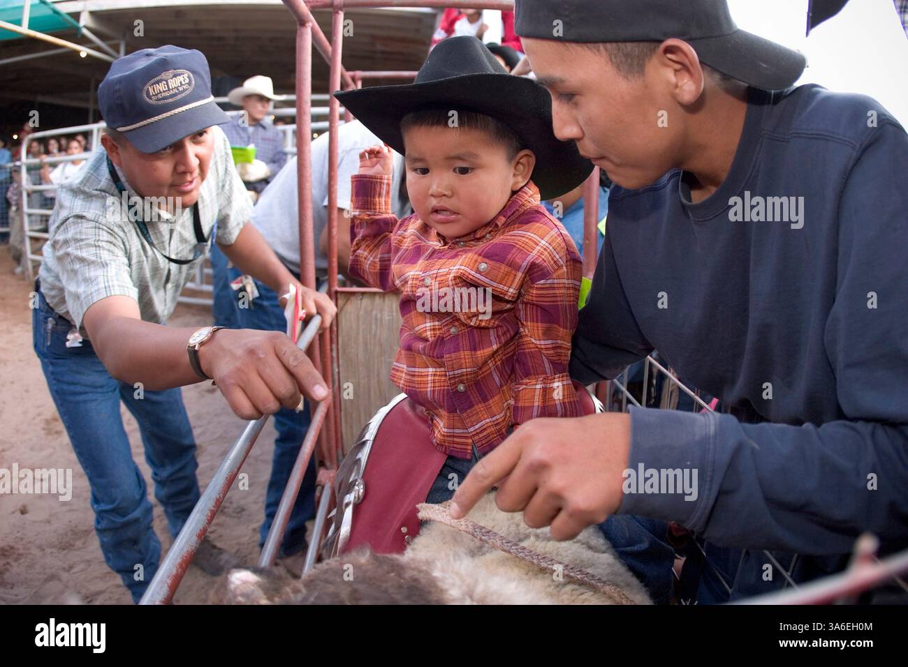 Sep 10, 2004; Window Rock, AZ, USA; The ''chute boss,'' left, helps a ...