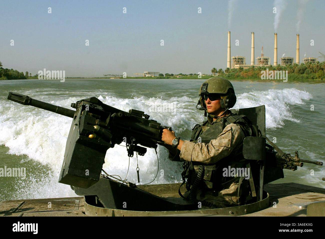 Oct 01, 2004; FOB Iskandariyah, Iraq; A Marine at the aft of a ...