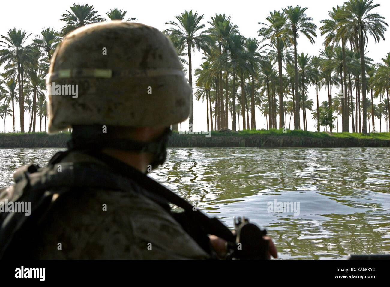 Oct 01, 2004; FOB Iskandariyah, Iraq; A U.S. Navy corpsmen provides ...