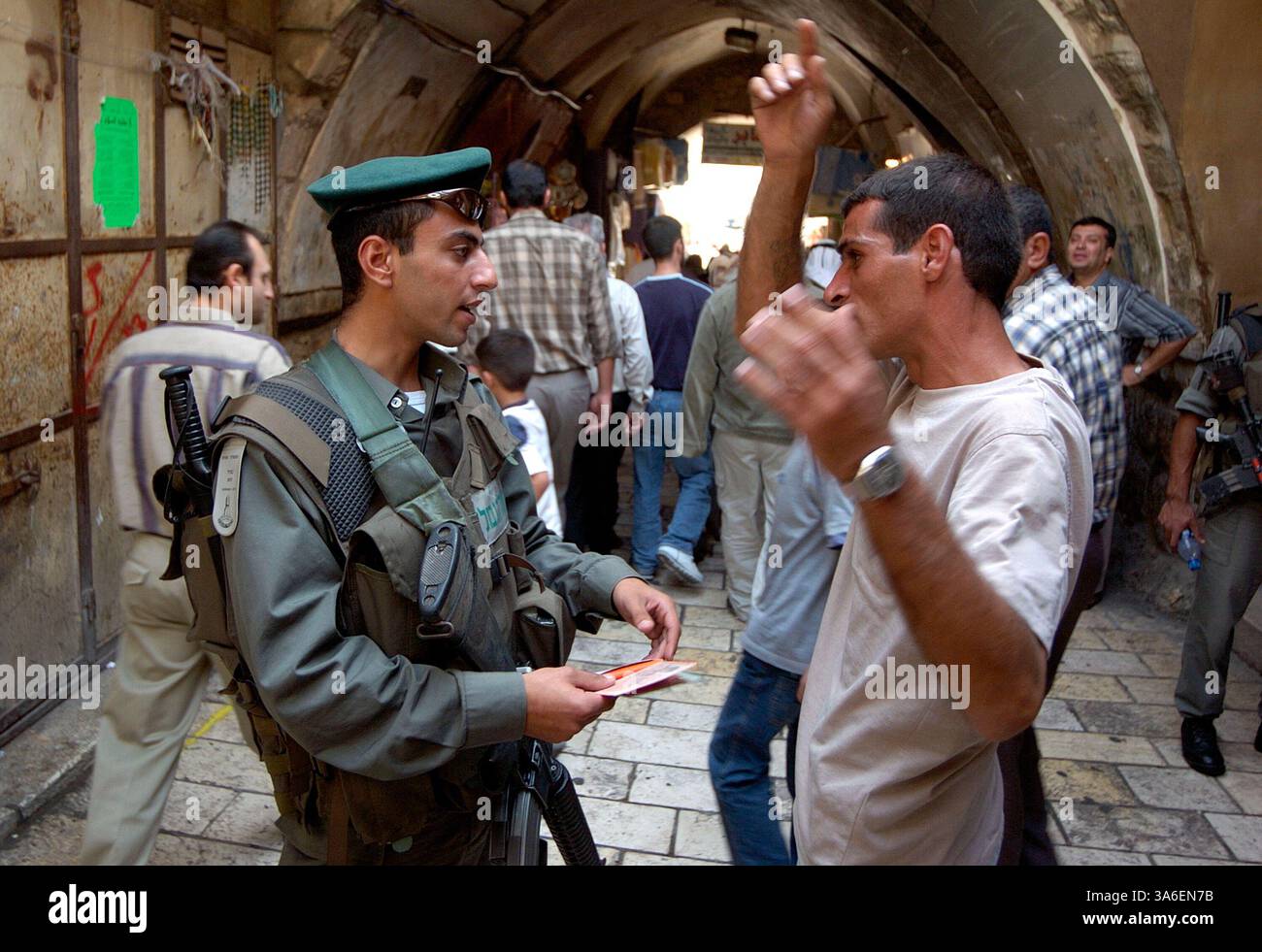 Oct 15, 2004; Jerusalem, ISRAEL; A Palestinian is stopped for an I.D ...