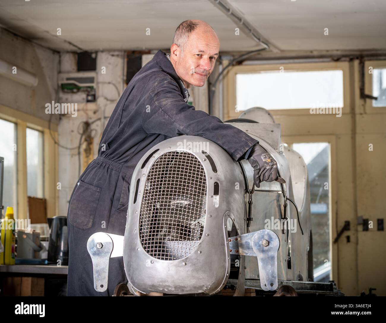 Horam, East Sussex, UK. 25th Mar, 2025. Alan Morris works on making the ...