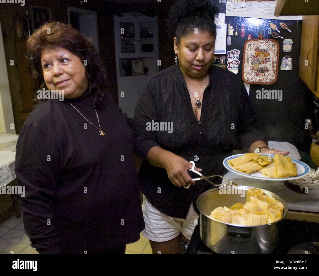 Nov. 12, 2007 - Emily Melgoza, right, her mother Margaret Perez, left ...