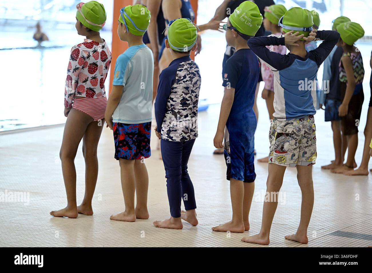 New York, USA. 25th Mar, 2025. A class of New York City 2nd graders attend a 'Swim for life ...