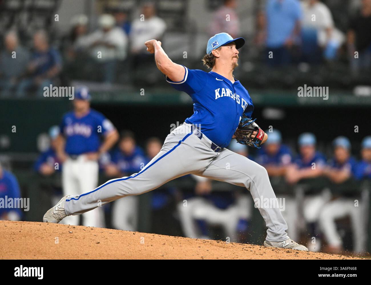 Kansas City Royals pitcher Hunter Harvey throws a pitch in an ...