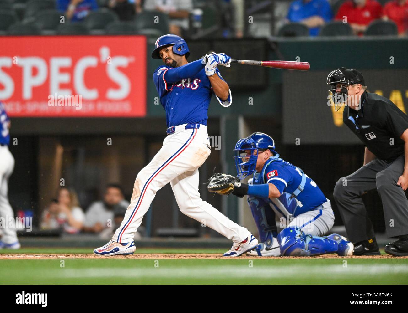 Texas Rangers second base Marcus Semien swings through a pitch as ...