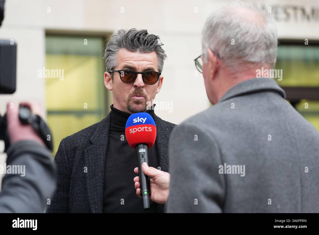 Former footballer Joey Barton speaks to the media outside Westminster ...