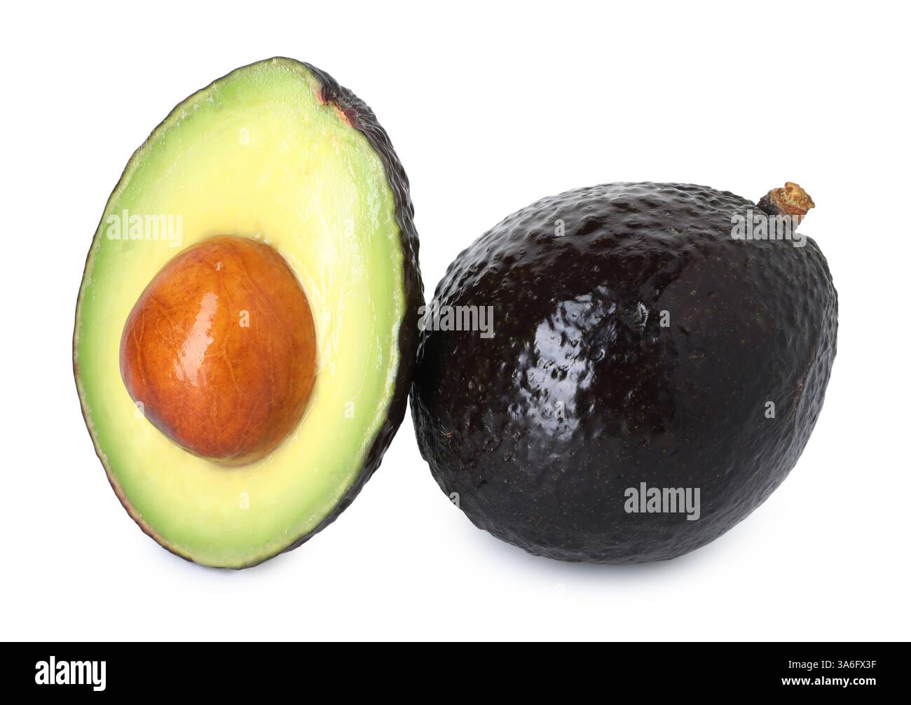 Whole and cut avocados isolated on white Stock Photo - Alamy
