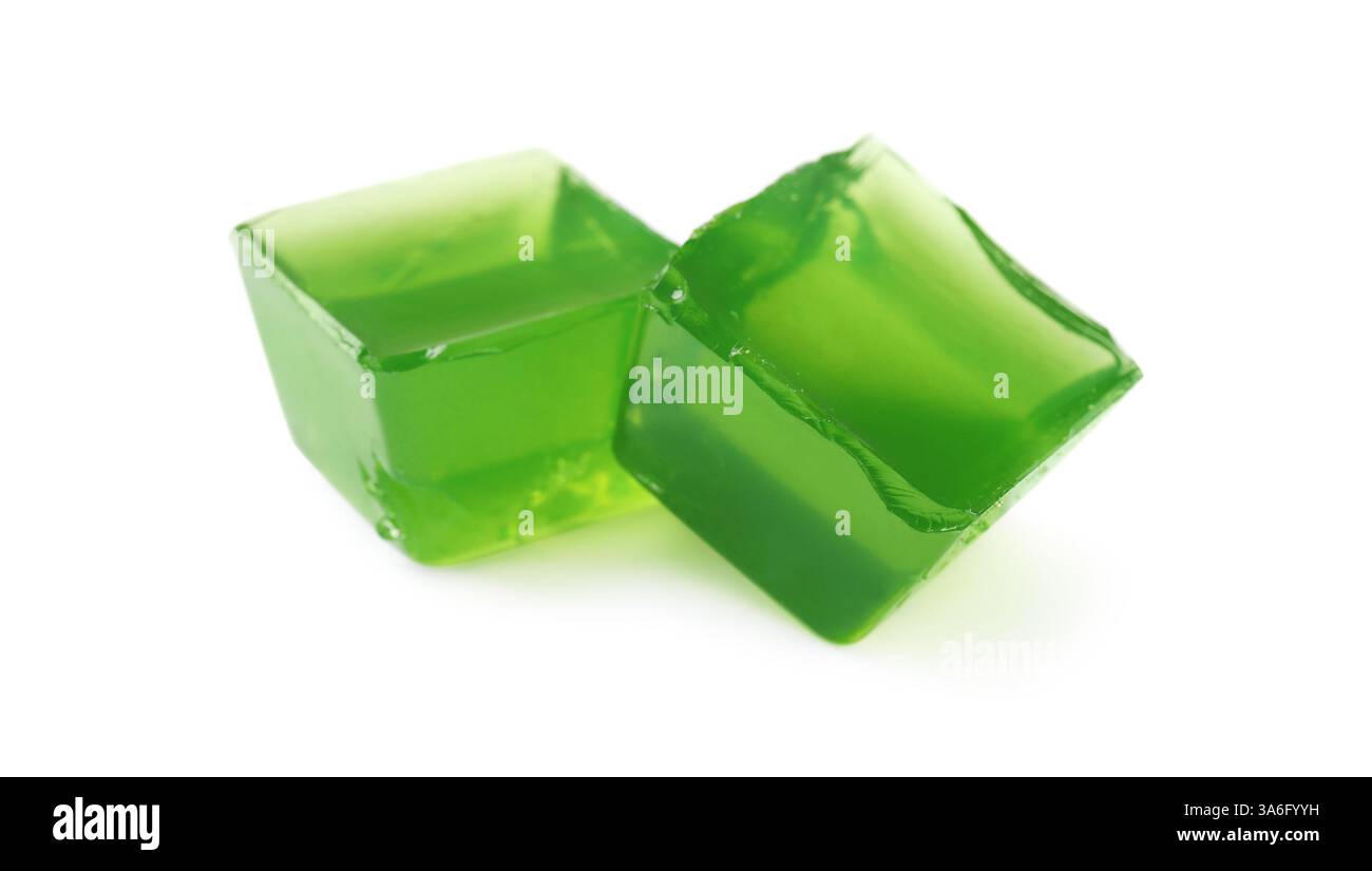 Tasty green jelly cubes isolated on white Stock Photo - Alamy