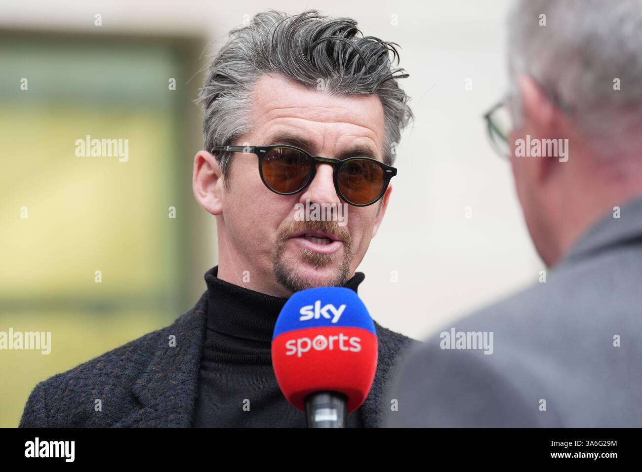 Former footballer Joey Barton speaks to the media outside Westminster ...