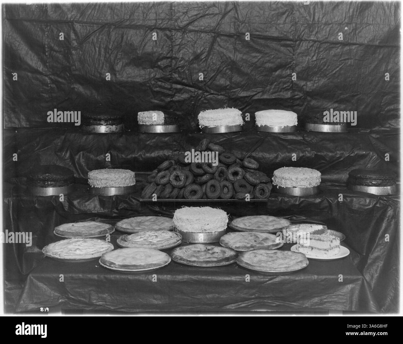 A bakery exhibit by the Girls' Vocational School, showcasing student ...