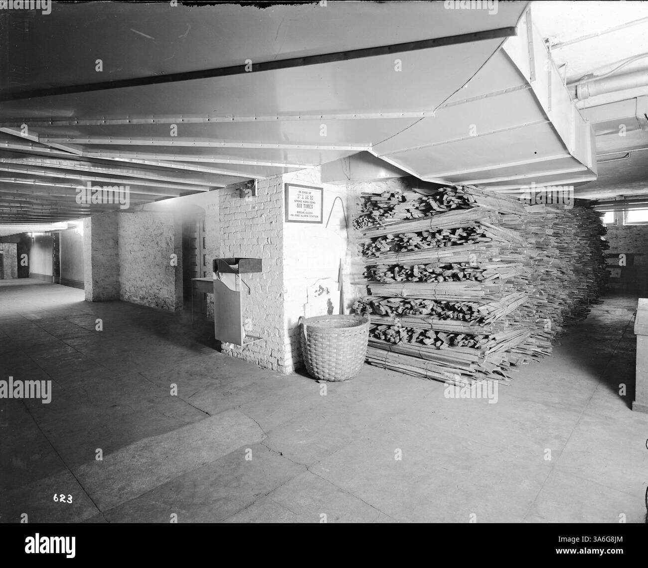 The basement of Clay School stores a woodpile, reflecting the practical ...