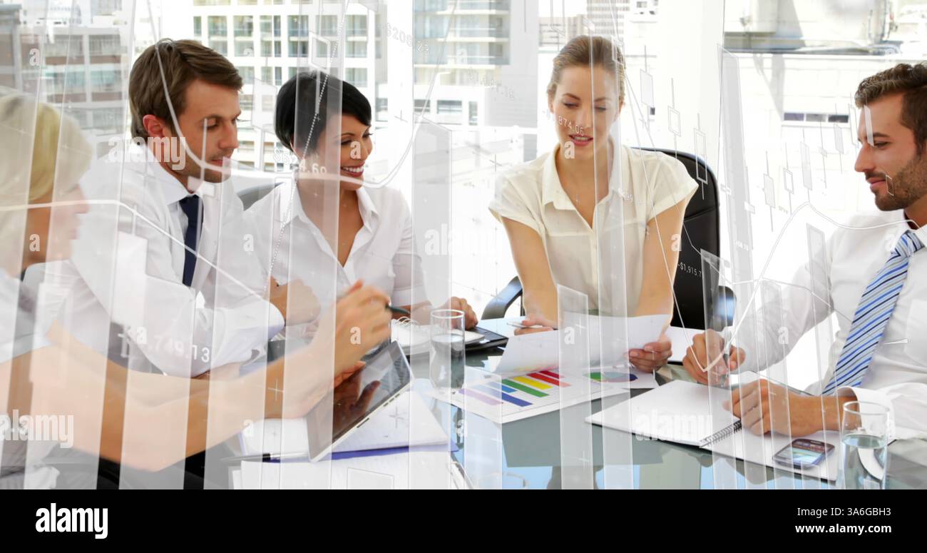 Collaborating in modern office, business team discussing documents and ...