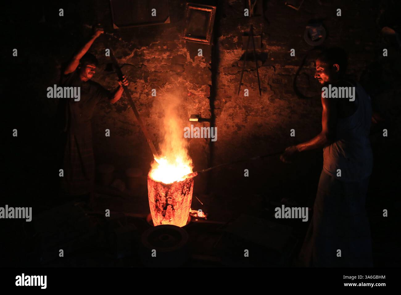 Oct 20, 2014 - Dhaka, Bangladesh - Cauldron of molten metal used to ...