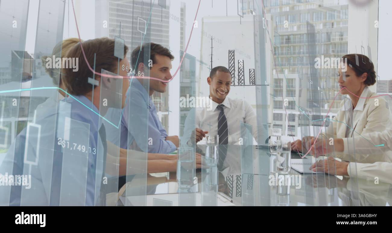 Business professionals discussing financial graphs during meeting in ...