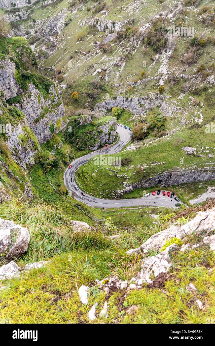View from above cliff edge of winding road Cheddar Gorge in Somerset ...
