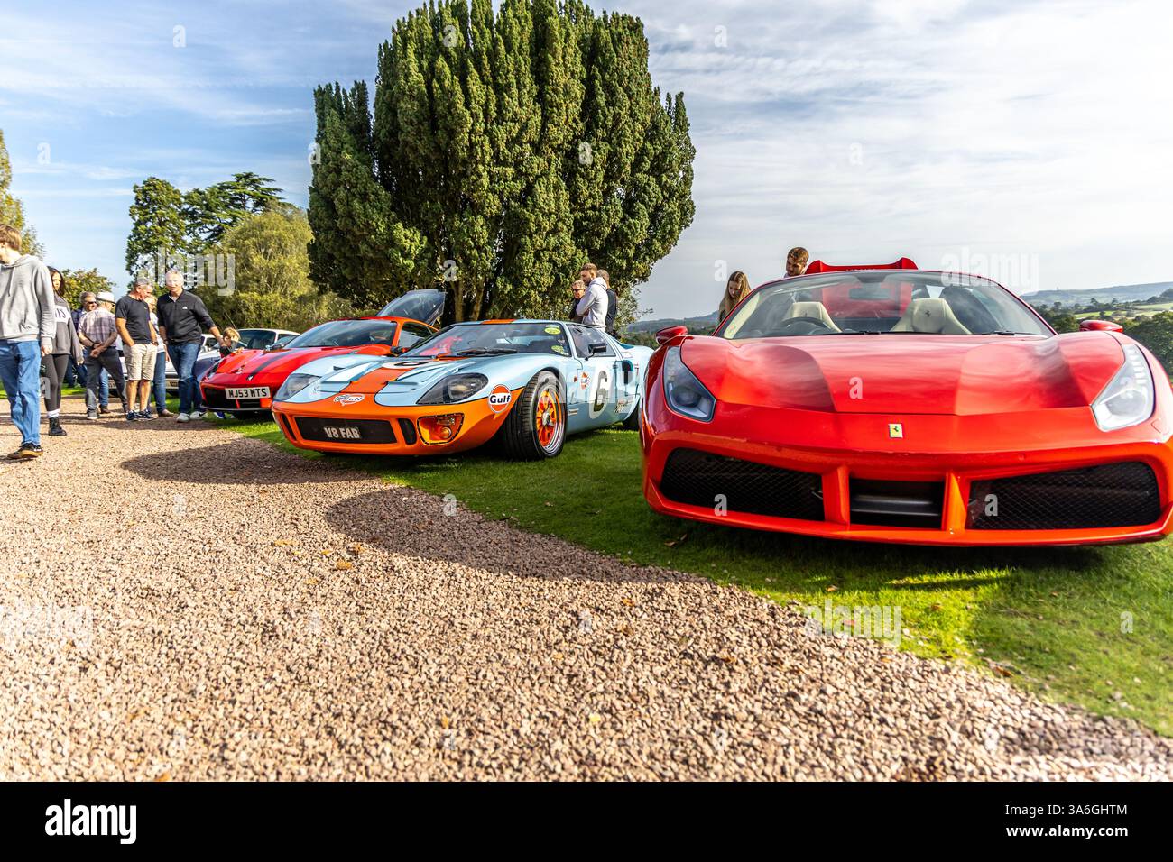 Bristol , UK - October 8, 2023: Busy car meet full of people looking ...