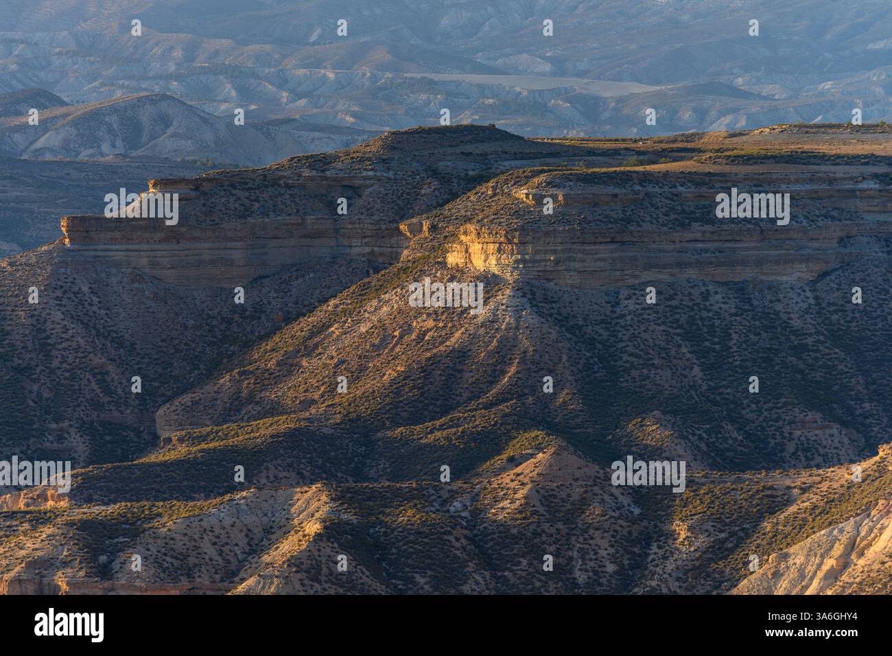 The breathtaking landscape of Granada Geopark showcases vast eroded ...