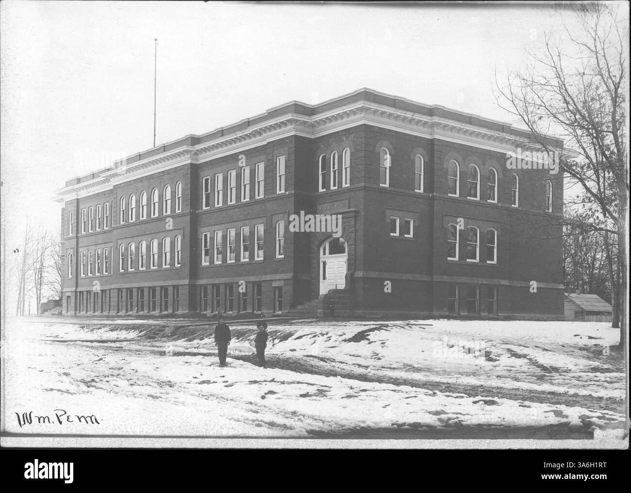 This image shows children standing outside Penn School in winter ...