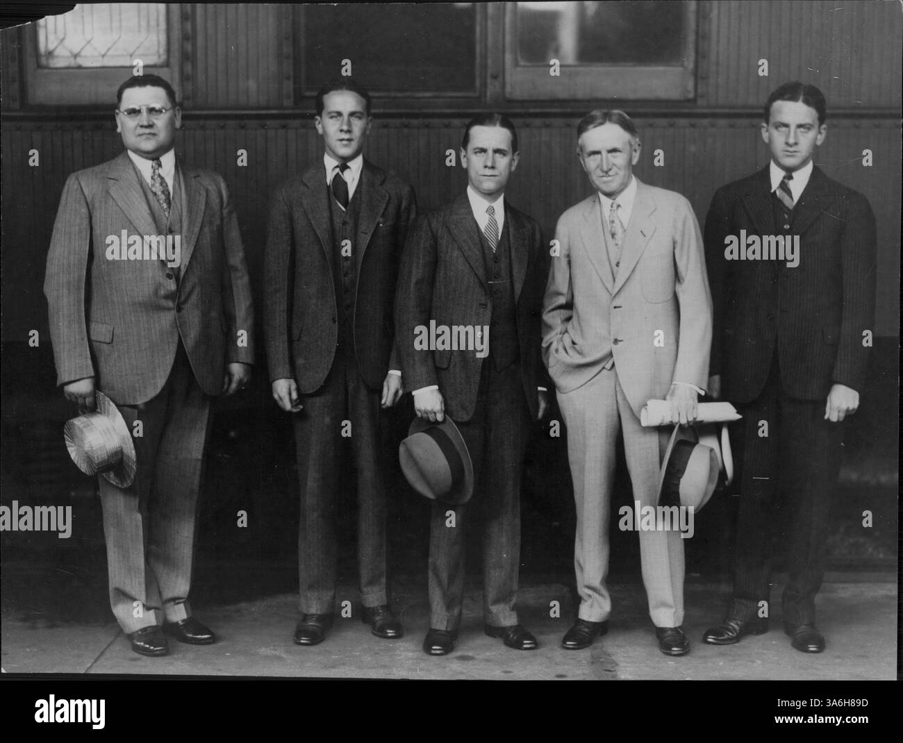 The image features key figures from Firestone Tire and Rubber Company ...